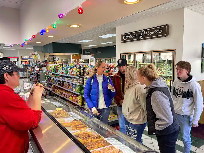 Where strangers become friends over shared donut enthusiasm. The interior may be simple, but the conversations about which flavor reigns supreme are complex.