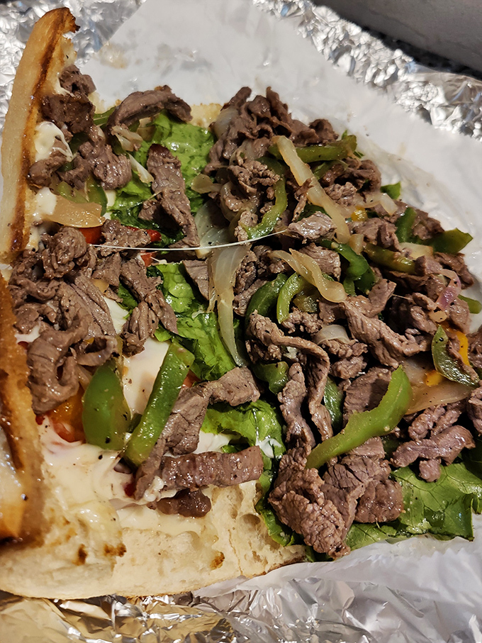 This isn't just a sandwich&mdash;it's architecture. Note how the layers of meat, cheese, and vegetables achieve structural integrity while remaining delicious.