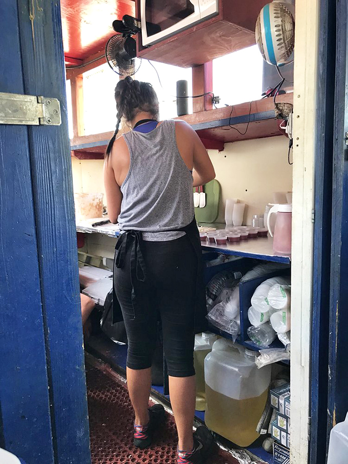 Behind every great fish and chips is a dedicated cook, working magic in a kitchen smaller than most walk-in closets.