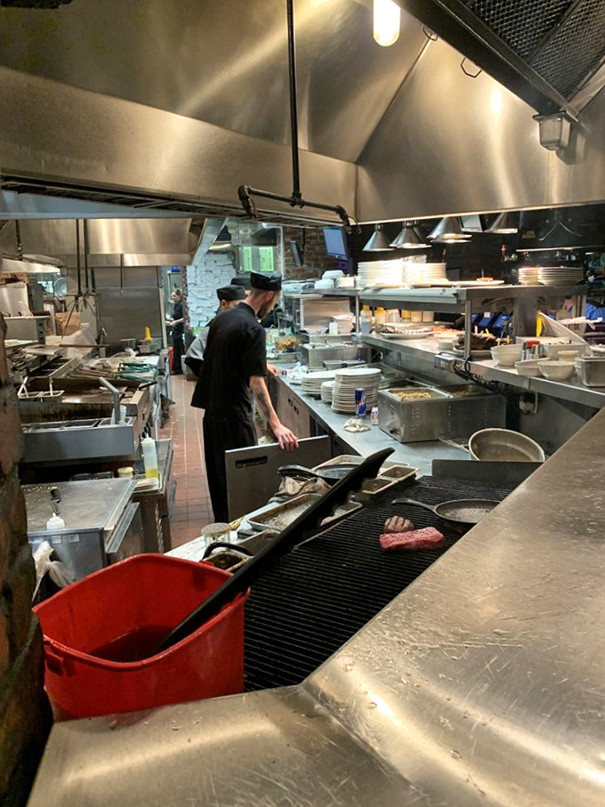 The kitchen: where the magic happens. This behind-the-scenes glimpse reveals the choreographed chaos that transforms raw ingredients into unforgettable meals.