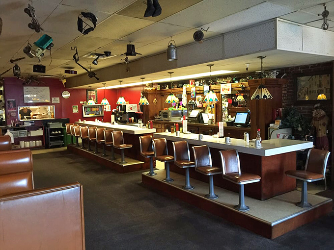 Diner counter seating: where solitary souls find community and everyone gets a front-row view of short-order cooking ballet.