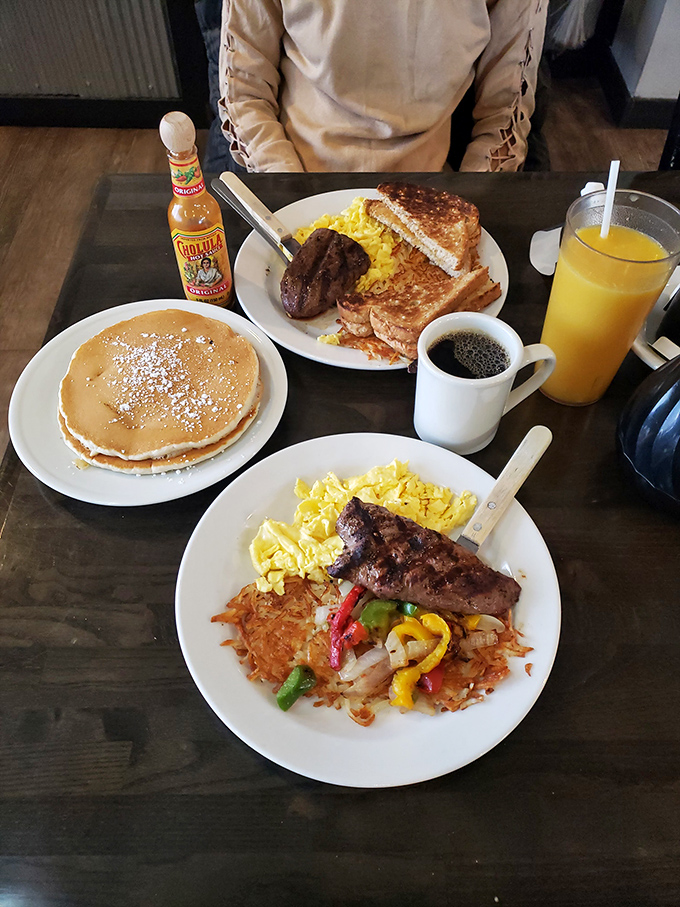 A breakfast spread that makes you want to invent new meals just to return sooner. Steak and eggs with colorful peppers? Yes, please.