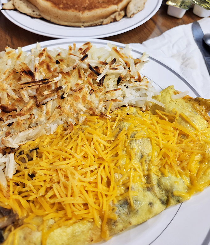 The Western omelet and hash browns&mdash;a cheese-covered landscape of breakfast perfection that makes hitting the snooze button seem like a criminal offense.