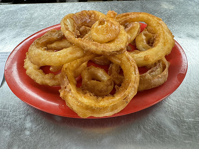 Onion rings that could double as golden bracelets&mdash;crispy, light, and large enough to make you wonder if they're growing special onions in Michigan.