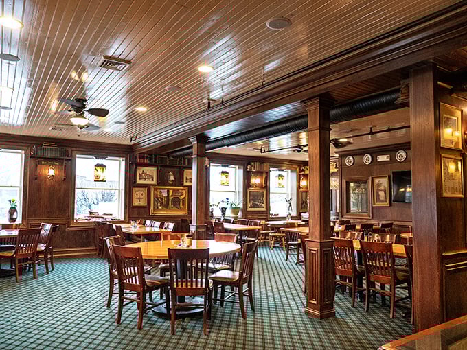 The dining room spreads before you like a wooden-clad haven. Those green carpets have witnessed countless celebrations and first dates.