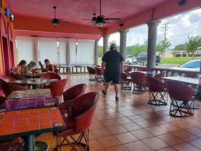 Al fresco dining with a Gulf Coast twist—this pink-hued patio offers the perfect setting for savoring south-of-the-border flavors.