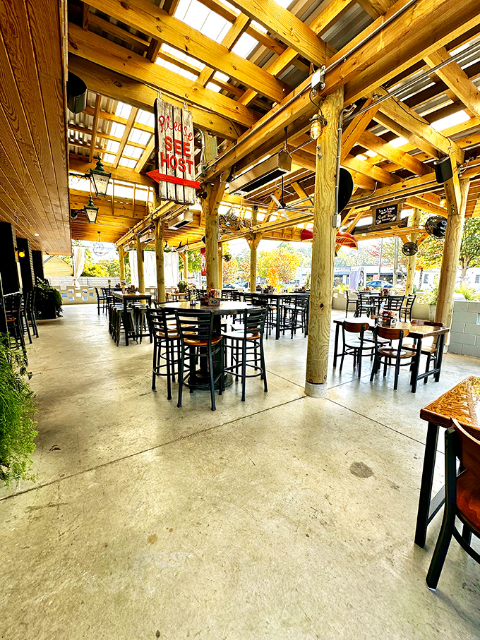 Rustic wooden beams frame this outdoor oasis. Atlanta's weather and Six Feet Under's patio were made for each other.