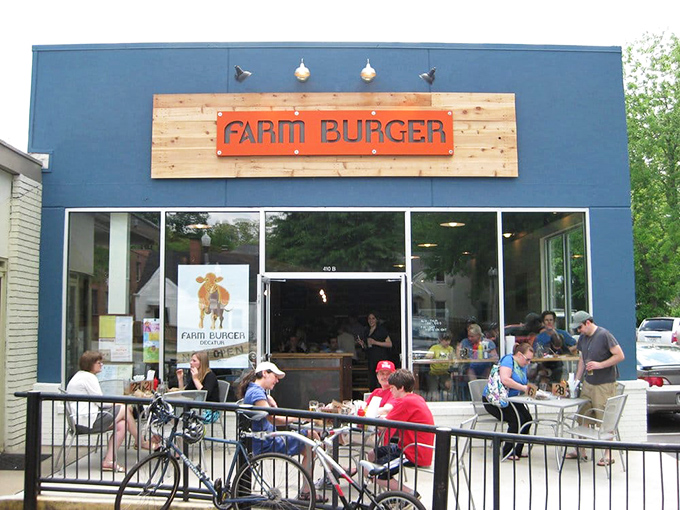 The outdoor seating area is where Decatur locals gather to worship at the altar of grass-fed beef on perfect spring days.