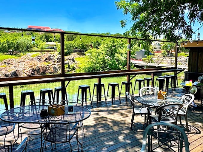 Dining with a view that can't be beat! Riverside Caf&eacute;'s outdoor seating area lets you enjoy your meal while Medicine Creek provides the soundtrack.