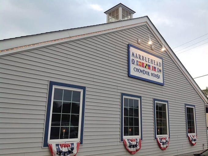 The gray exterior with patriotic bunting says "We take our seafood seriously, but we're not above a little stars-and-stripes celebration."