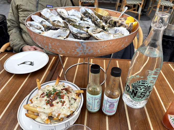 These oysters aren't just served &ndash; they're presented like the crown jewels of the ocean, with condiments as their loyal courtiers.