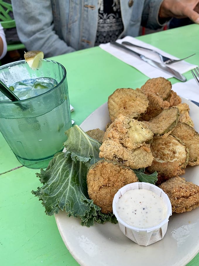 These golden-fried pickle chips might be the reason some people drive across state lines. Crispy, tangy, and utterly addictive.