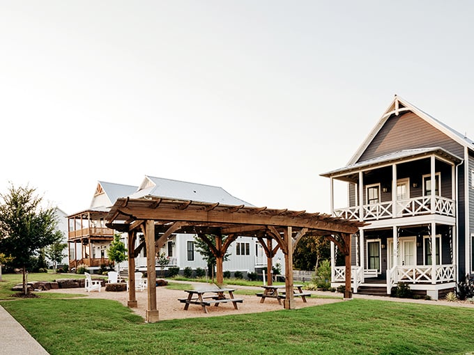 This rustic pergola isn't just outdoor dining &ndash; it's the backdrop for the kind of long, lazy conversations that turn into cherished memories.