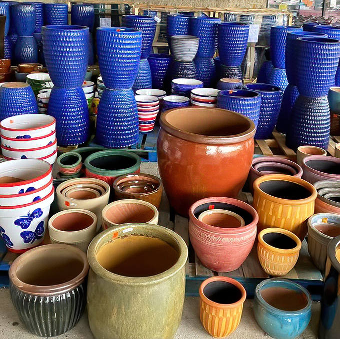 Ceramic pots in every conceivable color stand ready to house your plant babies, from the thriving succulents to the ones you're desperately trying to keep alive.