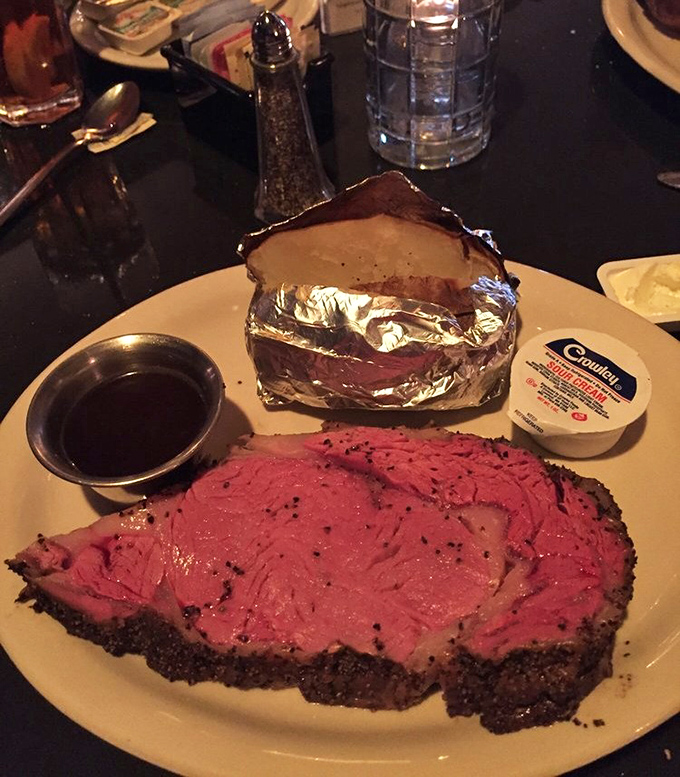 This isn't just prime rib &ndash; it's a masterclass in patience, aging, and precision, with a side of baked potato that's been dressed for the occasion.