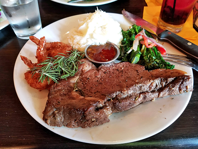 When prime rib is this perfect, the knife is just a formality. That mashed potato island in a sea of au jus deserves its own Instagram account.