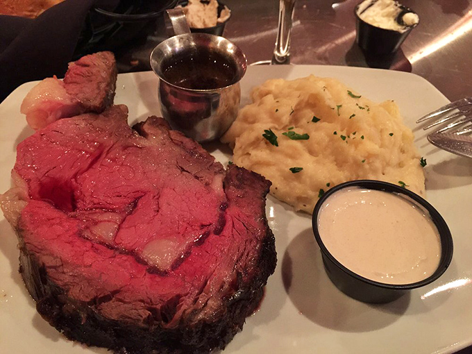 This isn't just dinner; it's an experience requiring three separate serving vessels. The au jus in its silver cup stands ready for its supporting role.
