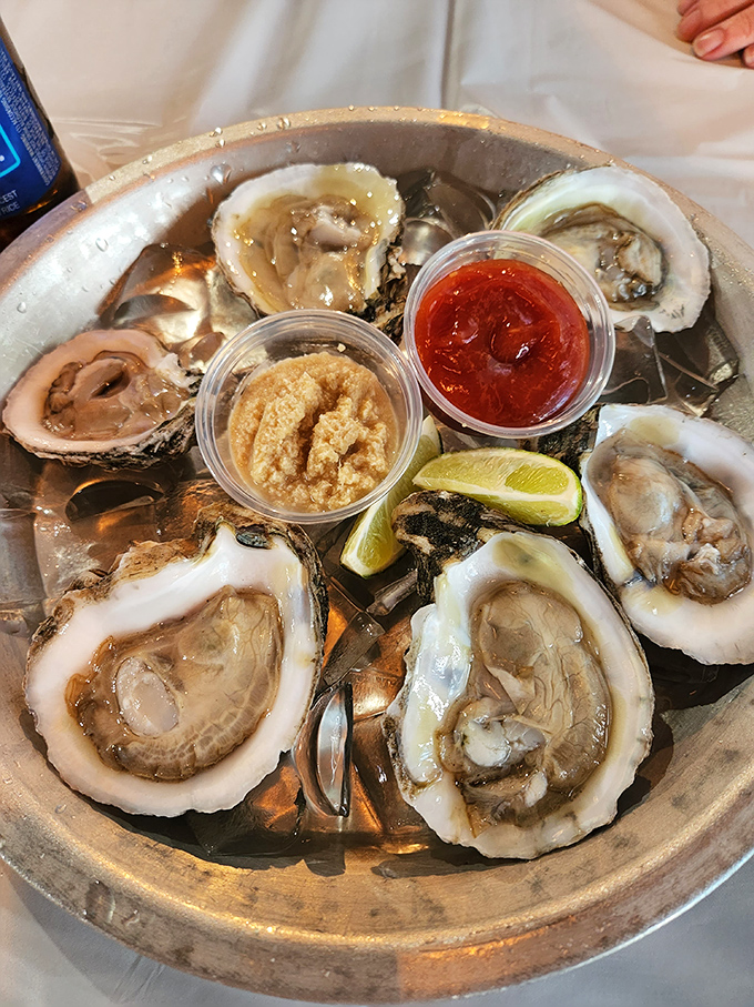 These oysters aren't just served&mdash;they're presented like the crown jewels of the ocean, with lime wedges standing by for a citrus coronation.