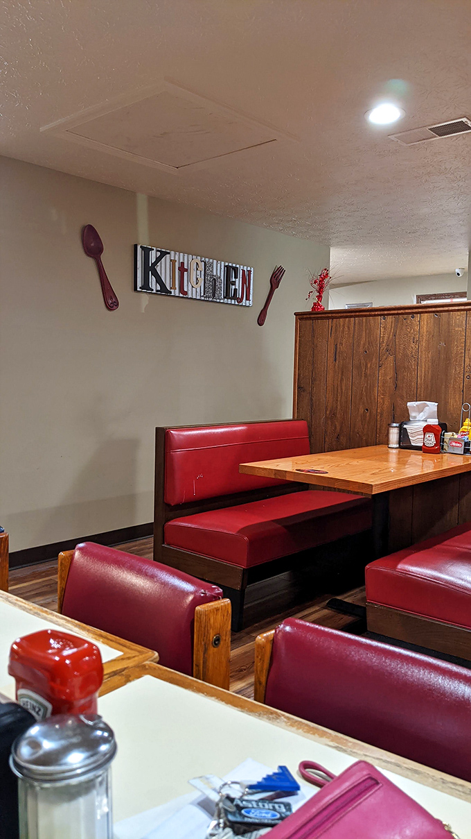 The "KITCHEN" sign flanked by oversized utensils says it all&mdash;this is a place that takes its food seriously without taking itself too seriously.
