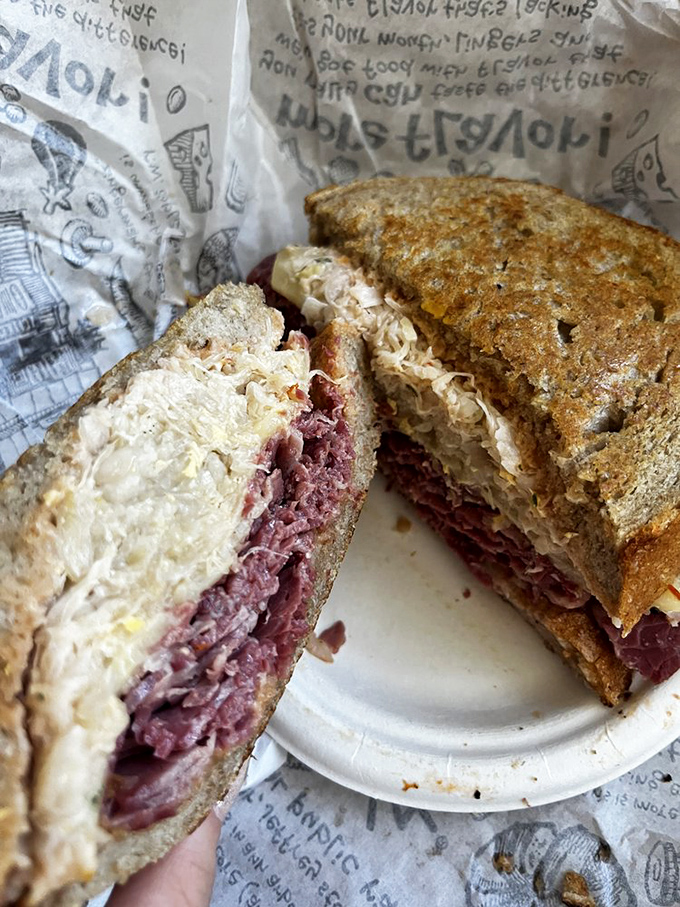 The legendary Reuben in its natural habitat&mdash;wax paper that soon becomes an archaeological record of your delicious journey.