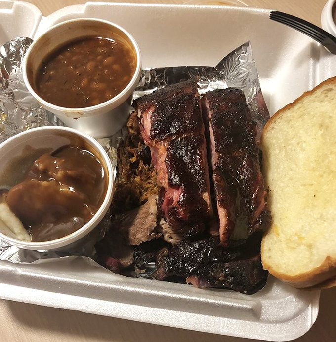 Ribs and beans in perfect harmony &ndash; like Martin and Lewis in their prime. That smoke ring tells you they've been slow-dancing with hickory for hours.