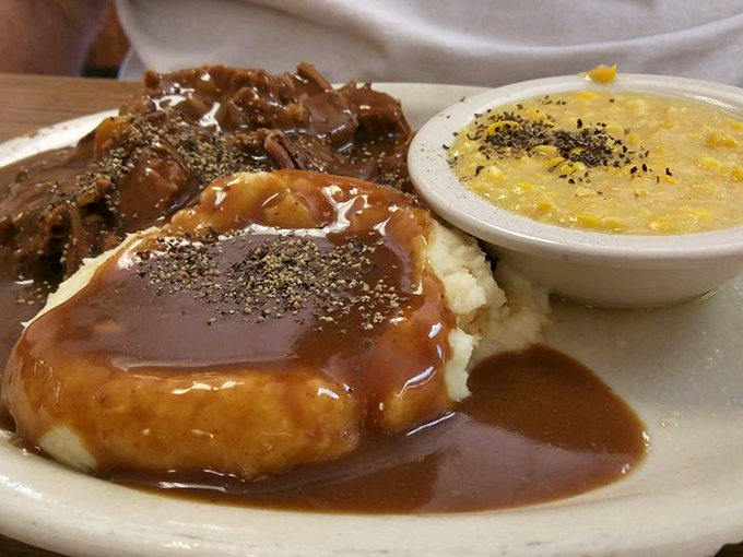Roast beef and mashed potatoes swimming in gravy with a side of corn &ndash; the kind of plate that makes you want to hug the cook.