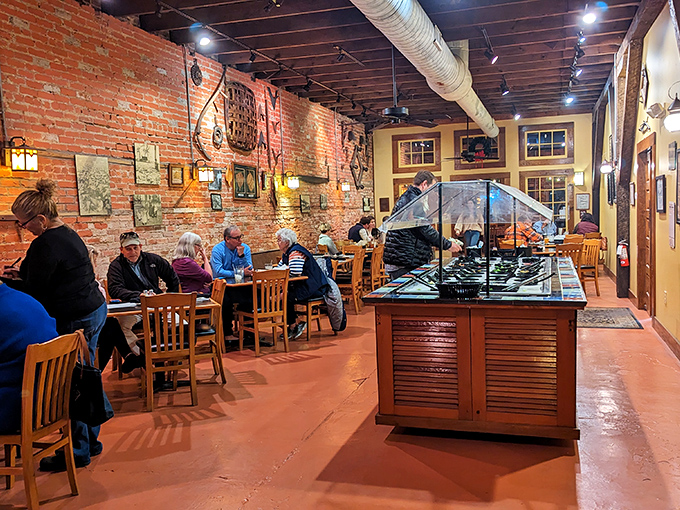 Diners enjoy their meals amid exposed brick walls and historical charm&mdash;a taste of Farmville's past with every delicious bite.
