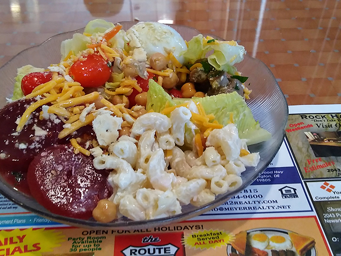 A salad that doesn't apologize for being a salad in a diner. This colorful bowl proves Route 40 knows vegetables deserve respect too, even alongside pasta salad.