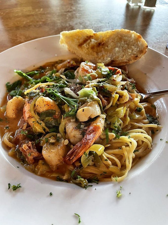 Seafood linguine that makes you question why you'd ever order anything else &ndash; a tangle of pasta playing host to an underwater reunion.