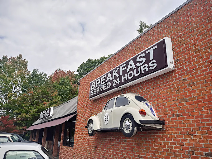 "BREAKFAST SERVED 24 HOURS" isn't just a sign; it's a promise that whenever hunger strikes, Herbie's Place has your back. 