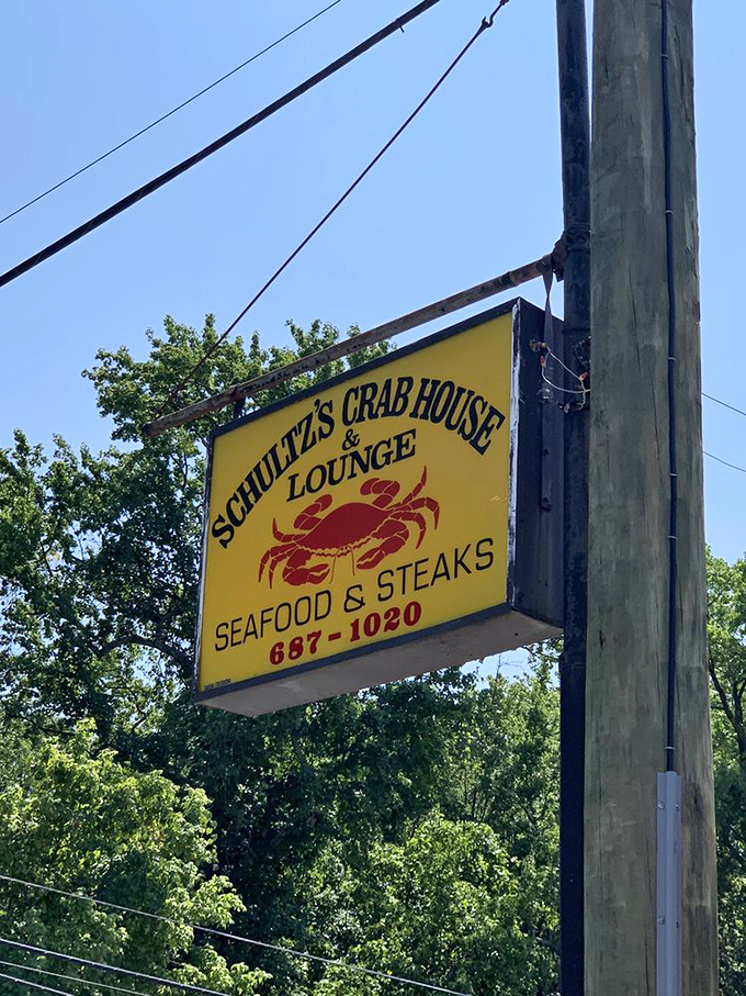 This sun-drenched sign is like a beacon to seafood lovers&mdash;the yellow background practically screaming "CRABS HERE!" to passing motorists.