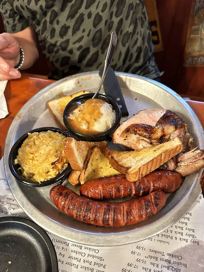 The breakfast of champions looks suspiciously like barbecue for lunch. Sausage, chicken, and sides that make nutritionists weep and taste buds rejoice.