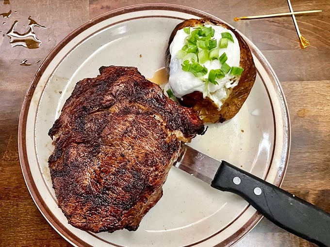 The Spencer steak and loaded baked potato: a duo more iconic than Batman and Robin, more satisfying than finding money in old pants.