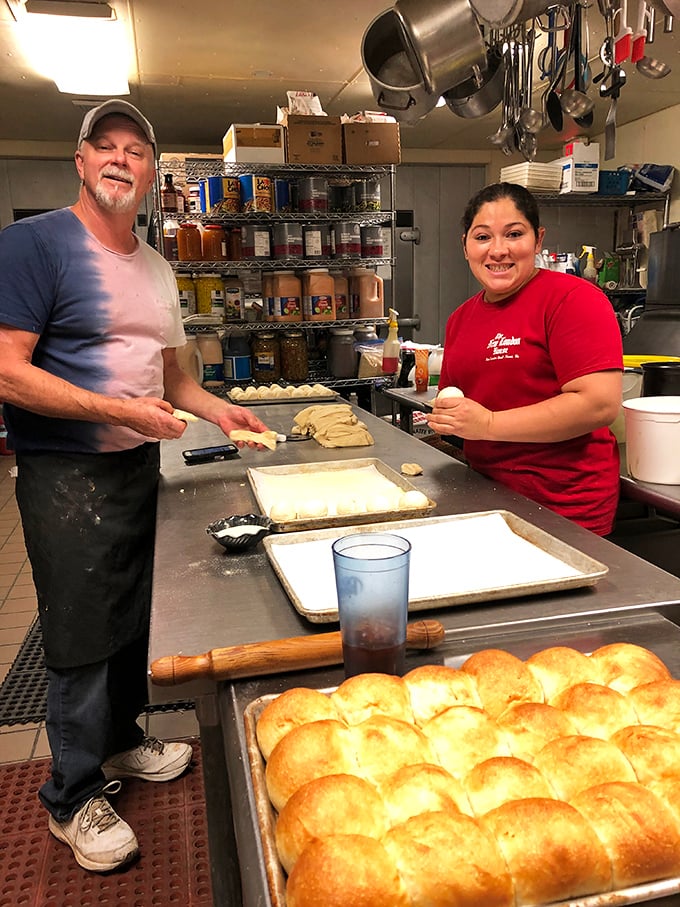 Behind every great roll is a great baker, and these folks clearly know their way around both dough and smiles.