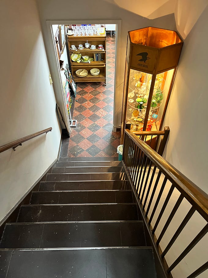 "The descent into more discoveries." These worn steps have carried thousands of treasure hunters between floors, each footfall bringing someone closer to finding their perfect piece.