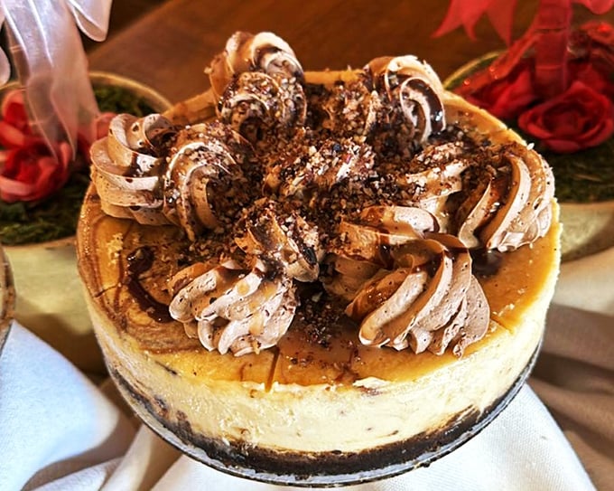 This turtle cheesecake wears its caramel and chocolate swirls like couture fashion. Those piped cream rosettes aren't just decoration&mdash;they're edible jewelry.