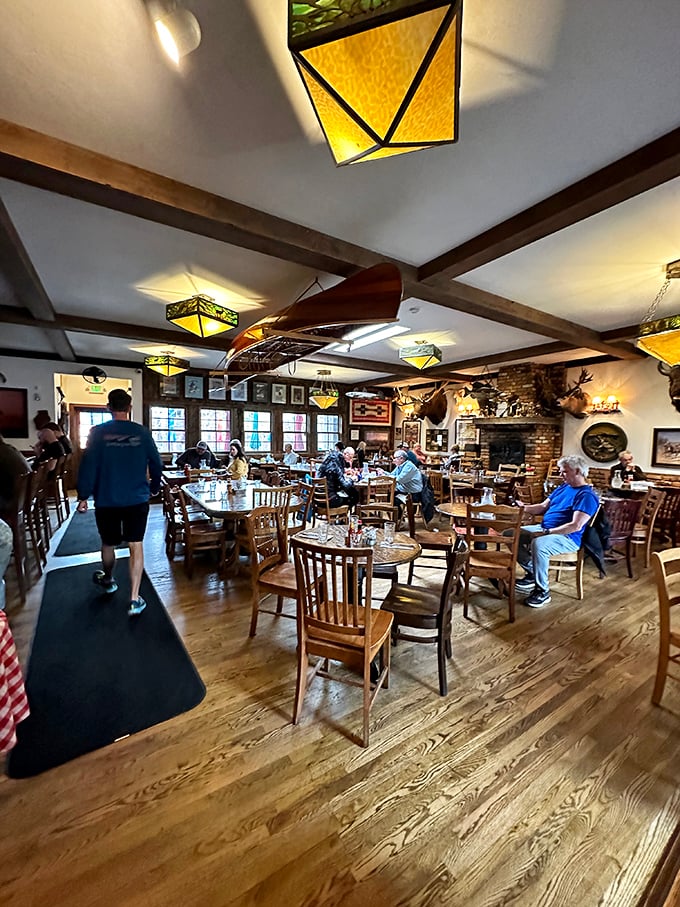 Wooden beams, stained glass lighting, and enough taxidermy to remind you that you're definitely not in a city anymore.