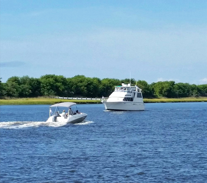 The view that comes complimentary with every meal &ndash; boats gliding past as you contemplate a second order of crab cakes.