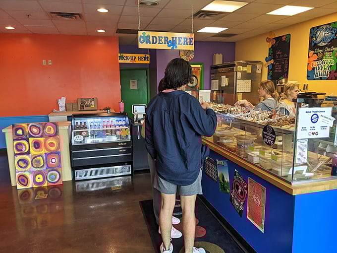 The moment of truth&mdash;a customer contemplates which circular masterpieces will make the journey home. Choose wisely, young grasshopper.