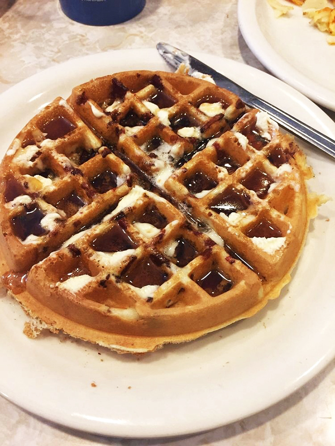 A waffle that understands the importance of proper grid structure. The perfect vehicle for maple syrup delivery, with butter melting into each perfect square.