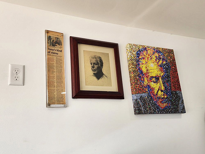 Wall fame that tells a story. The framed articles and photos speak to decades of excellence and famous visitors who've made the pilgrimage.