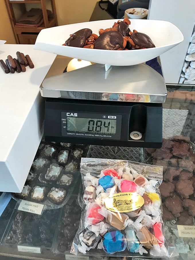Science meets sweetness at the weighing station. Never has "heavy" been such a welcome description when measuring out chocolate-covered nuts.