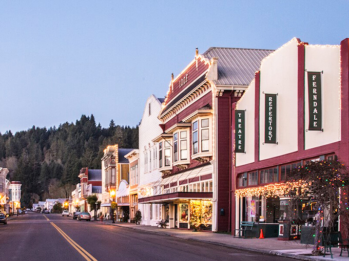 Main Street glows with holiday lights as dusk settles. Even the theater marquee seems to whisper, "Slow down, you're in Ferndale now."