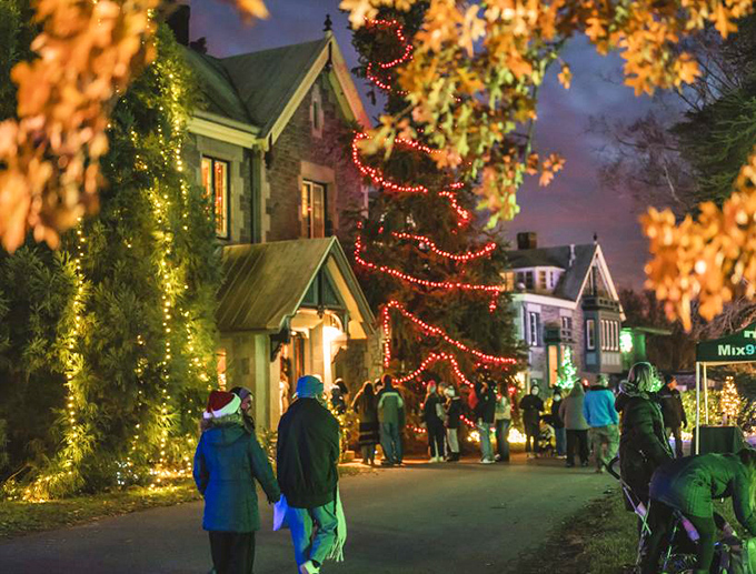 Winter evenings in New Castle glow with holiday magic, when centuries-old homes dress in their festive best like contestants in a timeless pageant.