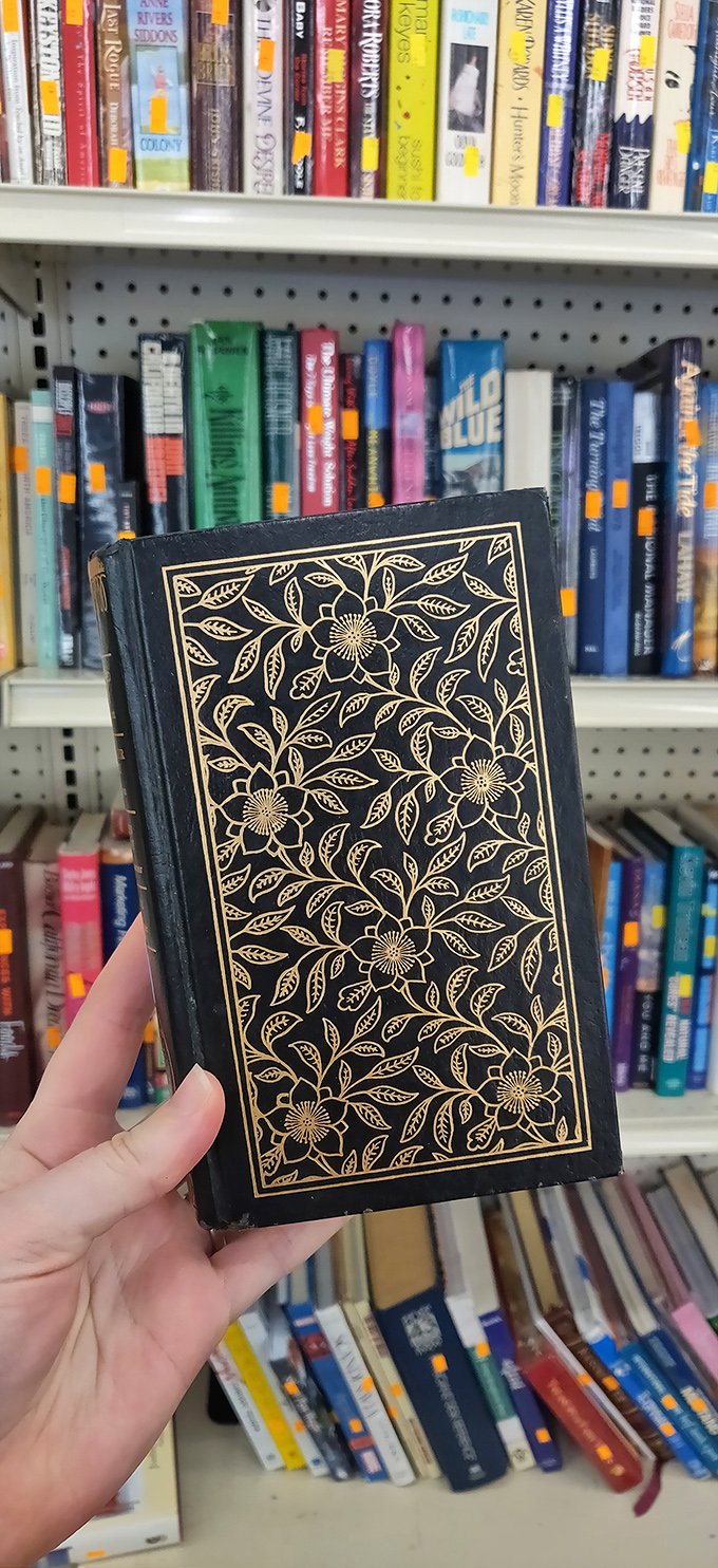 Gold-embossed leather binding that makes your e-reader look like a plastic impostor. Books with character don't need a charging cable.