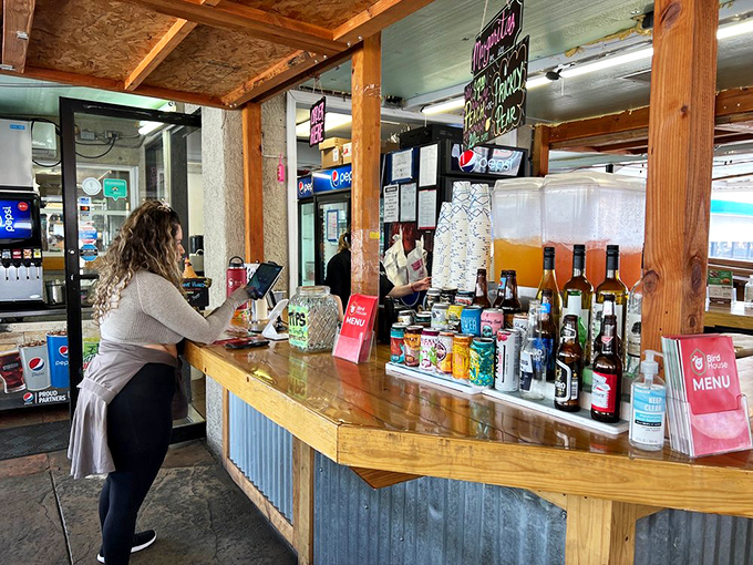 The bar area offers cold beverages that pair perfectly with hot chicken – nature's most perfect combination after a day at Lake Powell.