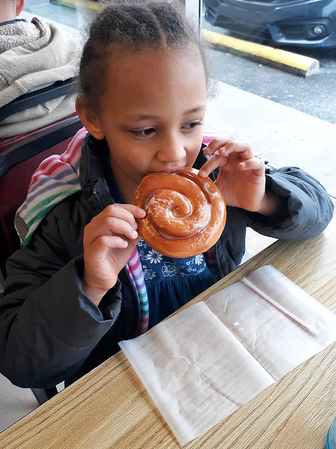 The universal expression of donut joy knows no age limit. This is how food traditions get passed down.