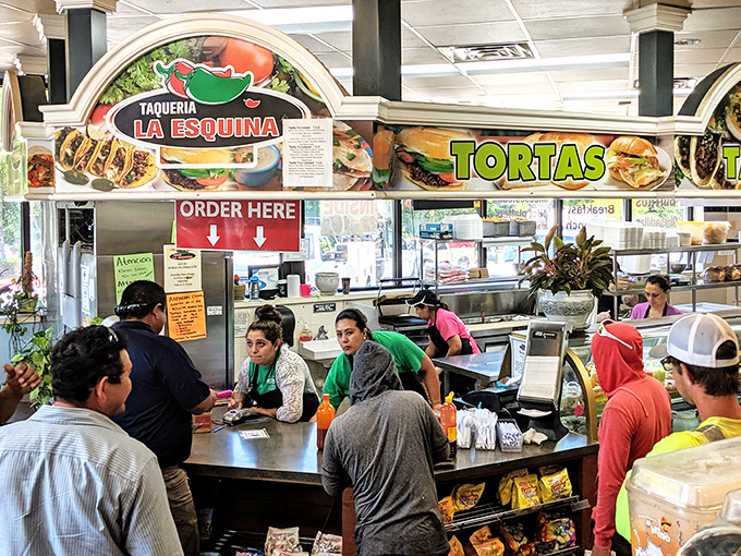 Lunchtime brings a diverse crowd united by a common mission: securing some of the most authentic Mexican food this side of the border.