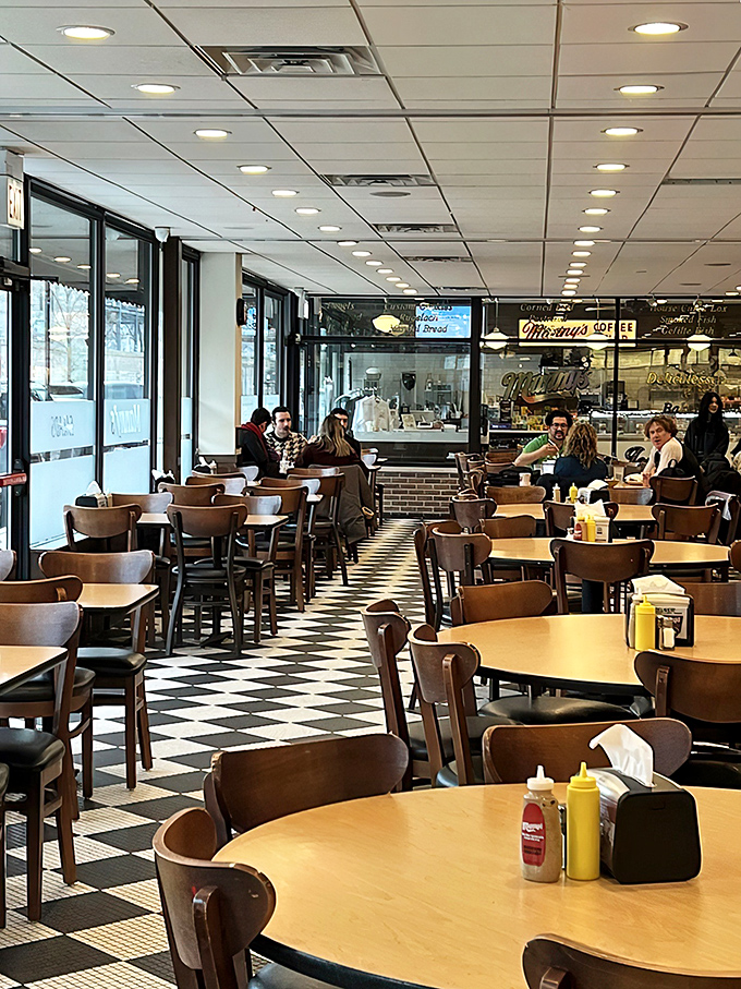 Where wooden chairs and formica tables set the stage for the real stars: conversations, connections, and corned beef.