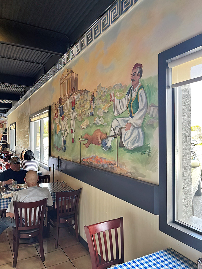 Art that feeds your soul while you feed your body&mdash;Greek murals watching over diners like culinary guardian angels.